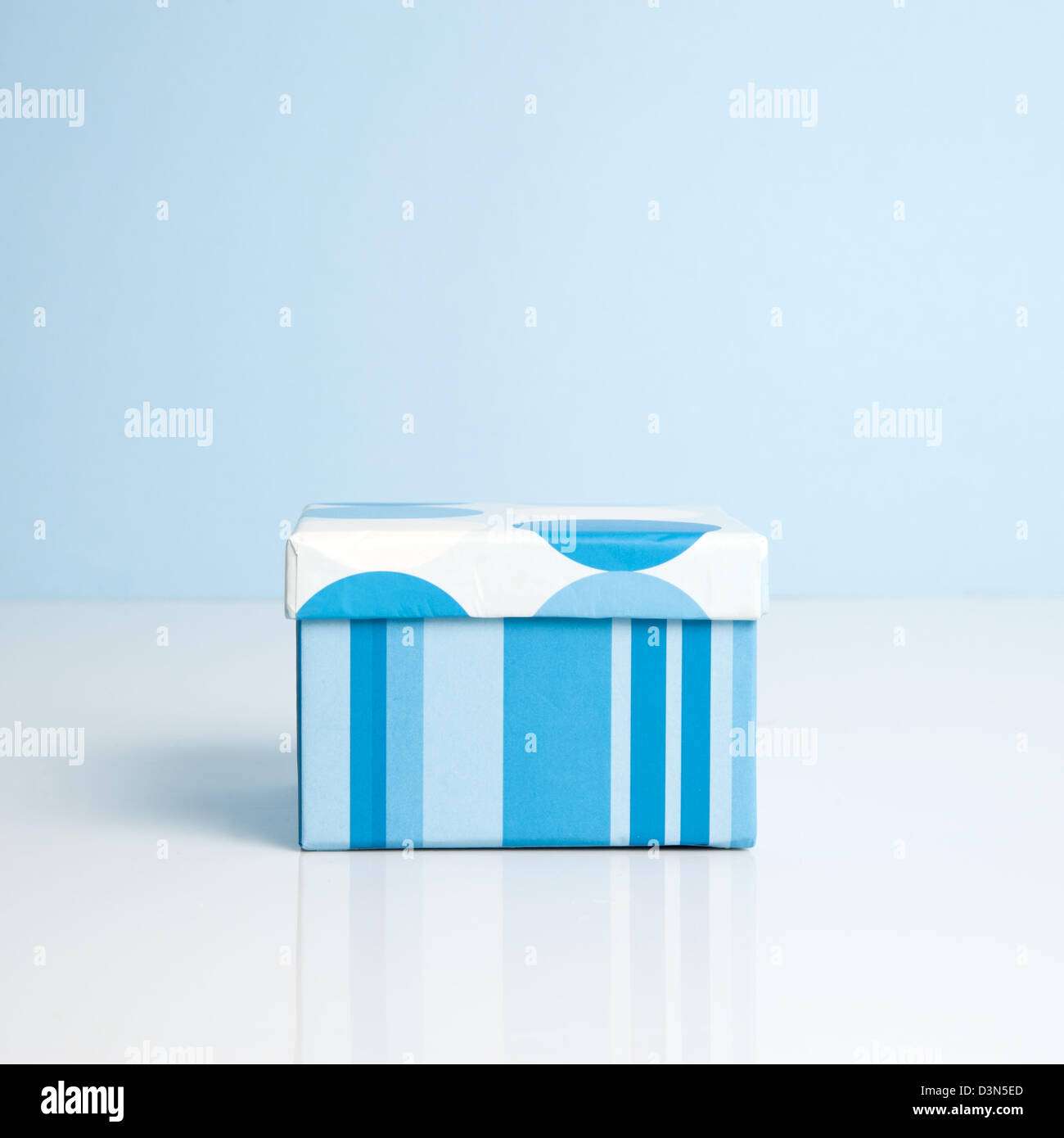 Simple blue and white gift box Stock Photo - Alamy