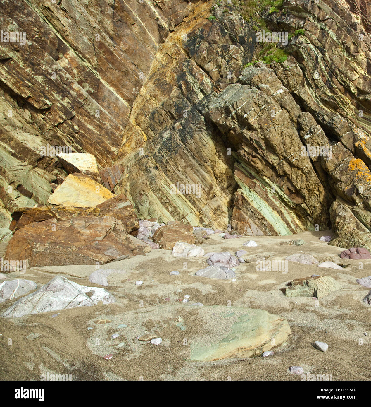 Rock and cliff faces with a varied geology at marloes sands beach ...