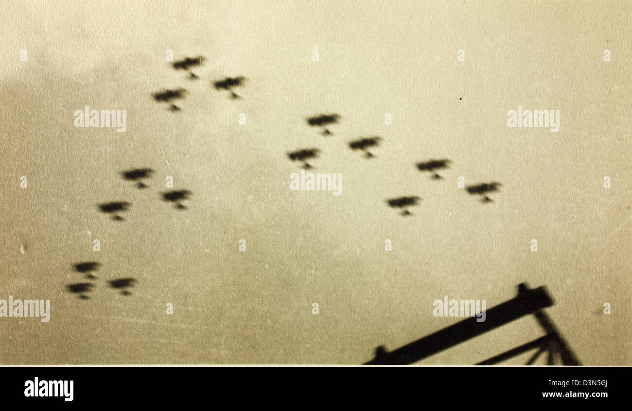 A historic flight formation captures multiple aircraft flying in close ...
