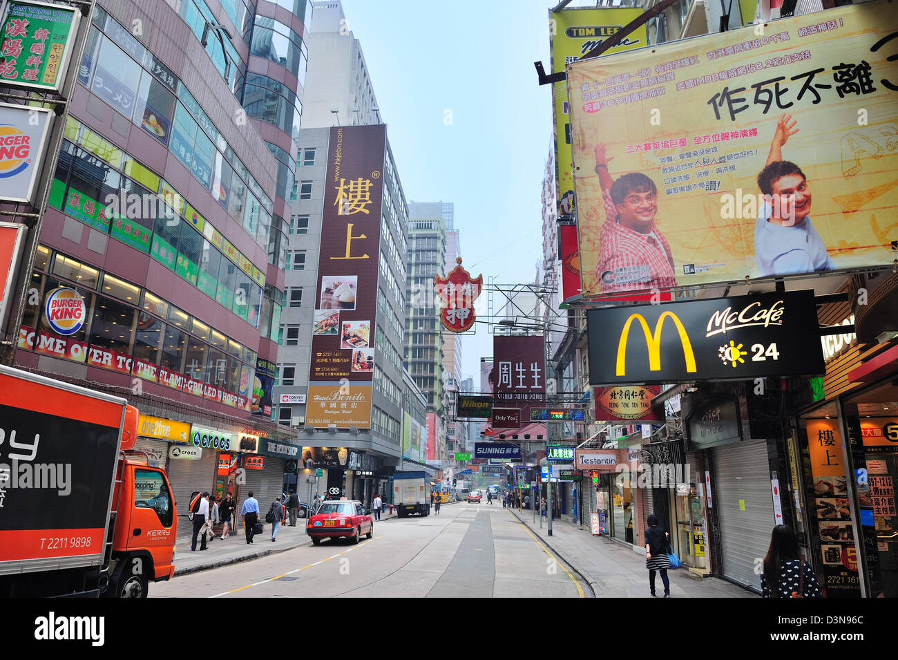 Street view with traffic Stock Photo - Alamy