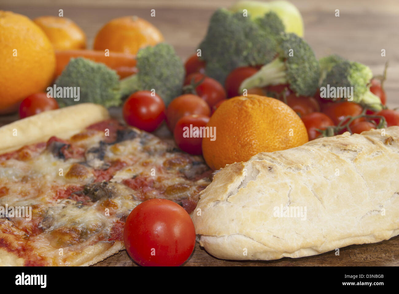 composition of foods: pizza bread and vegetables Stock Photo - Alamy