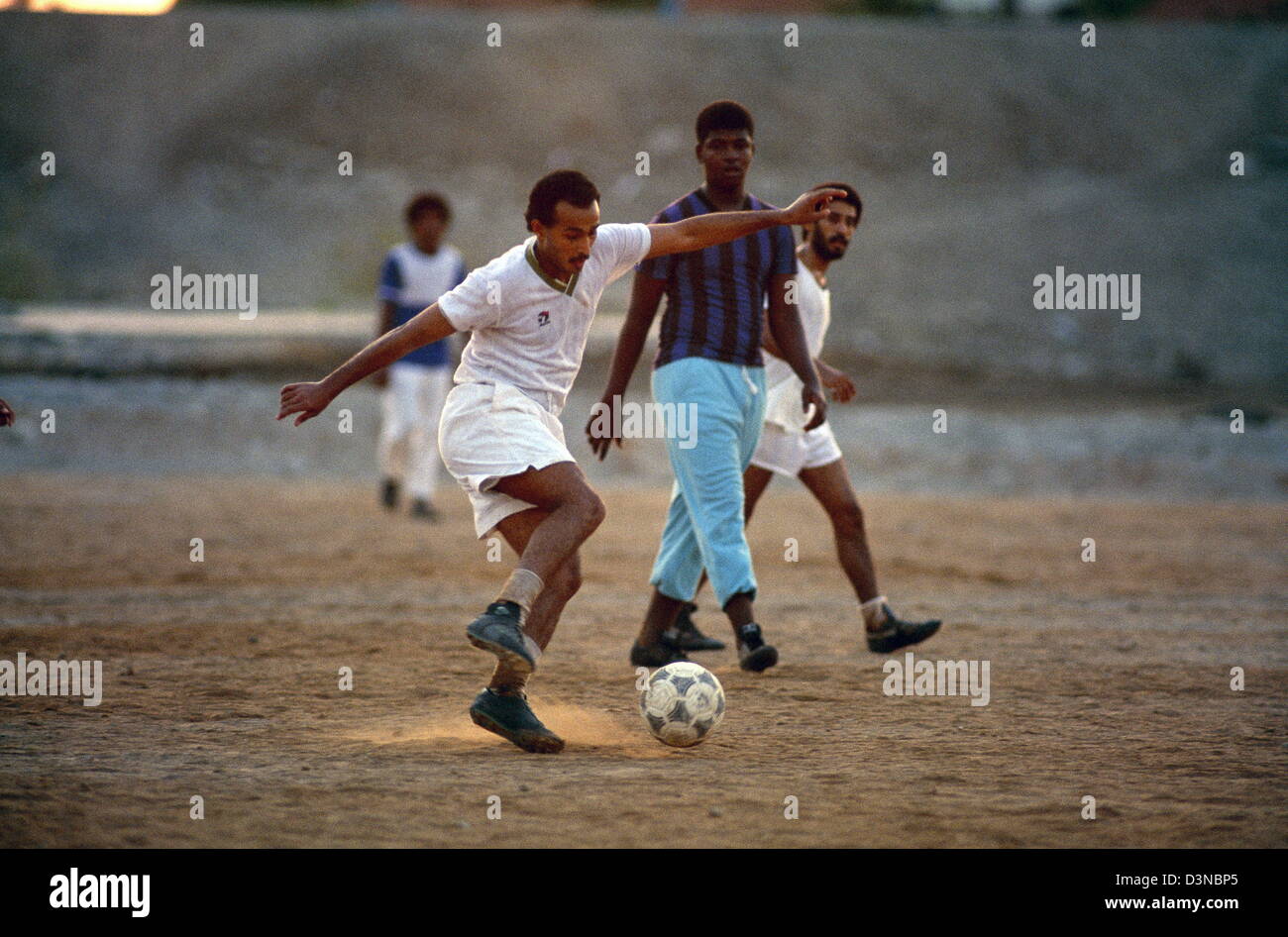 A group of Saudi's playing a friendly neighborhood football match Stock ...