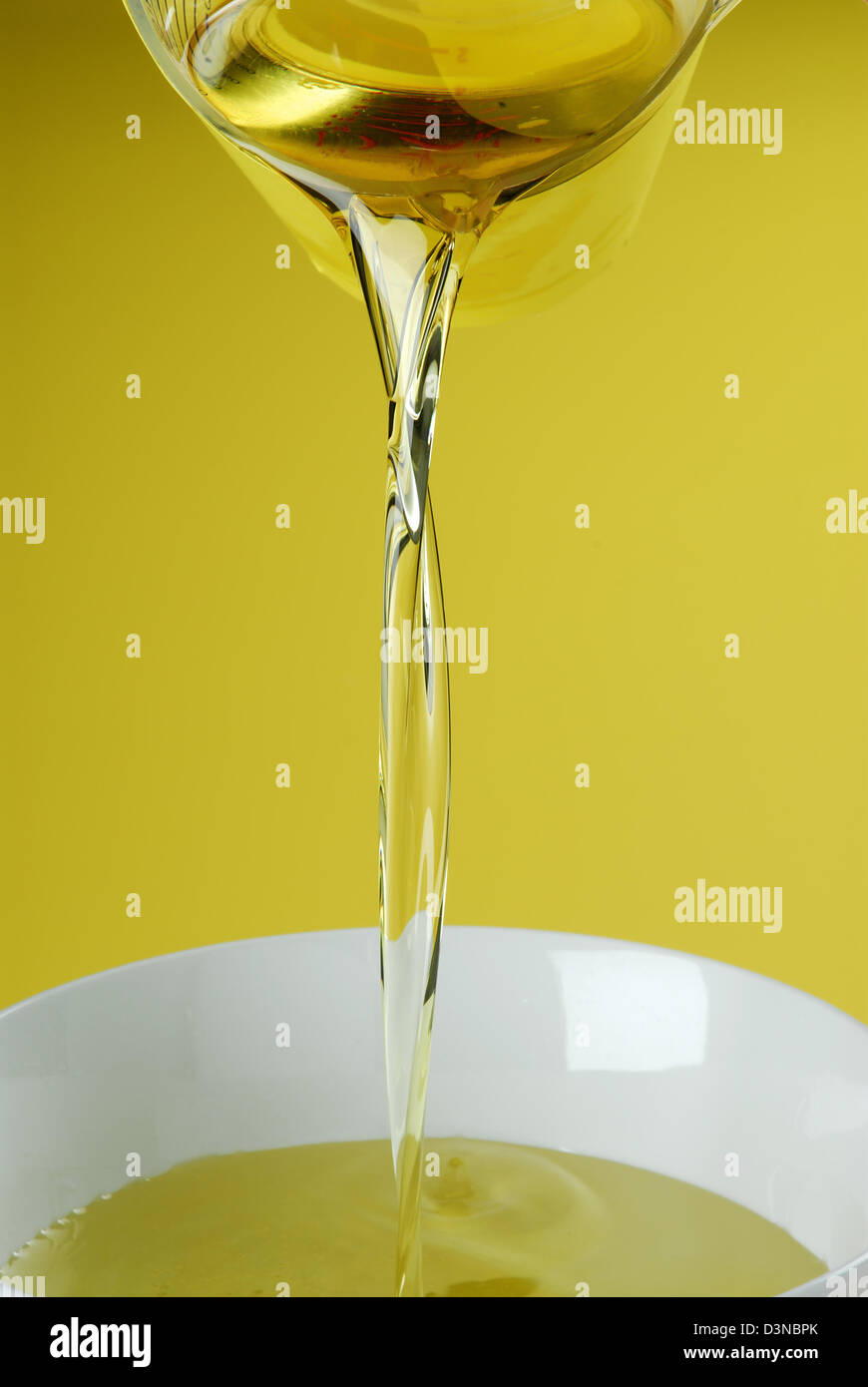 Pouring golden oils hi-res stock photography and images - Alamy