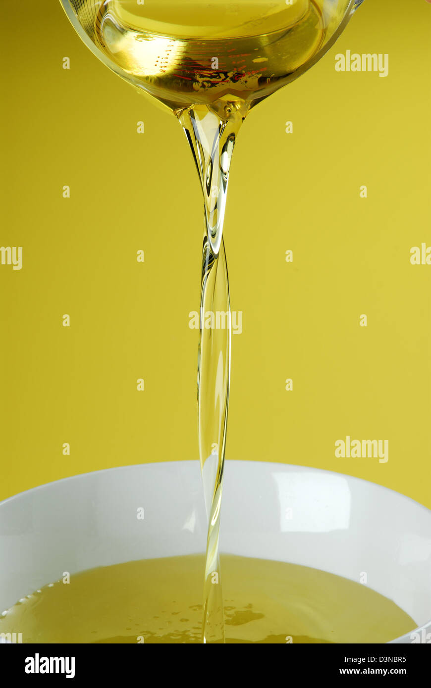 Pouring golden oils hi-res stock photography and images - Alamy