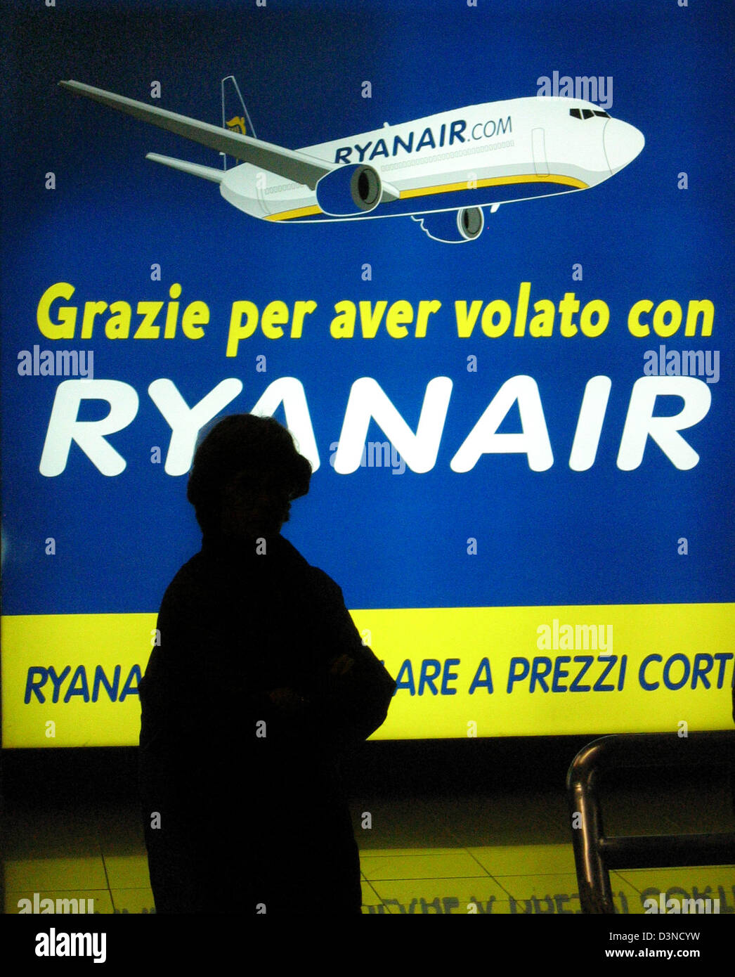 (FILE) - A passenger is pictured in front of a Ryanair ad at Ciampino ...