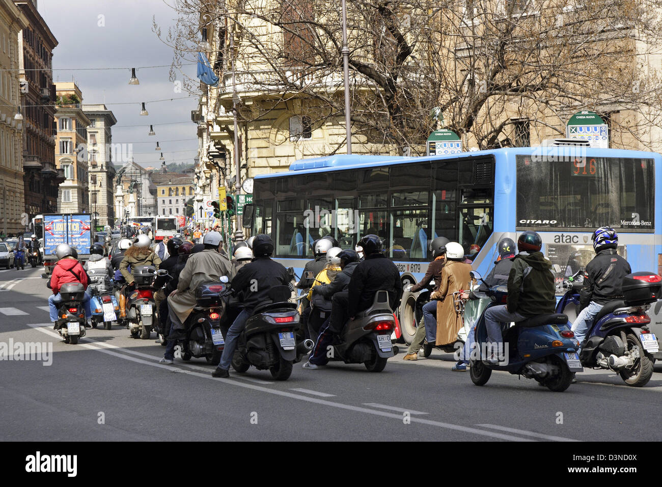 A street scene in Rome, Italy, March 2006, showing the typical moped ...