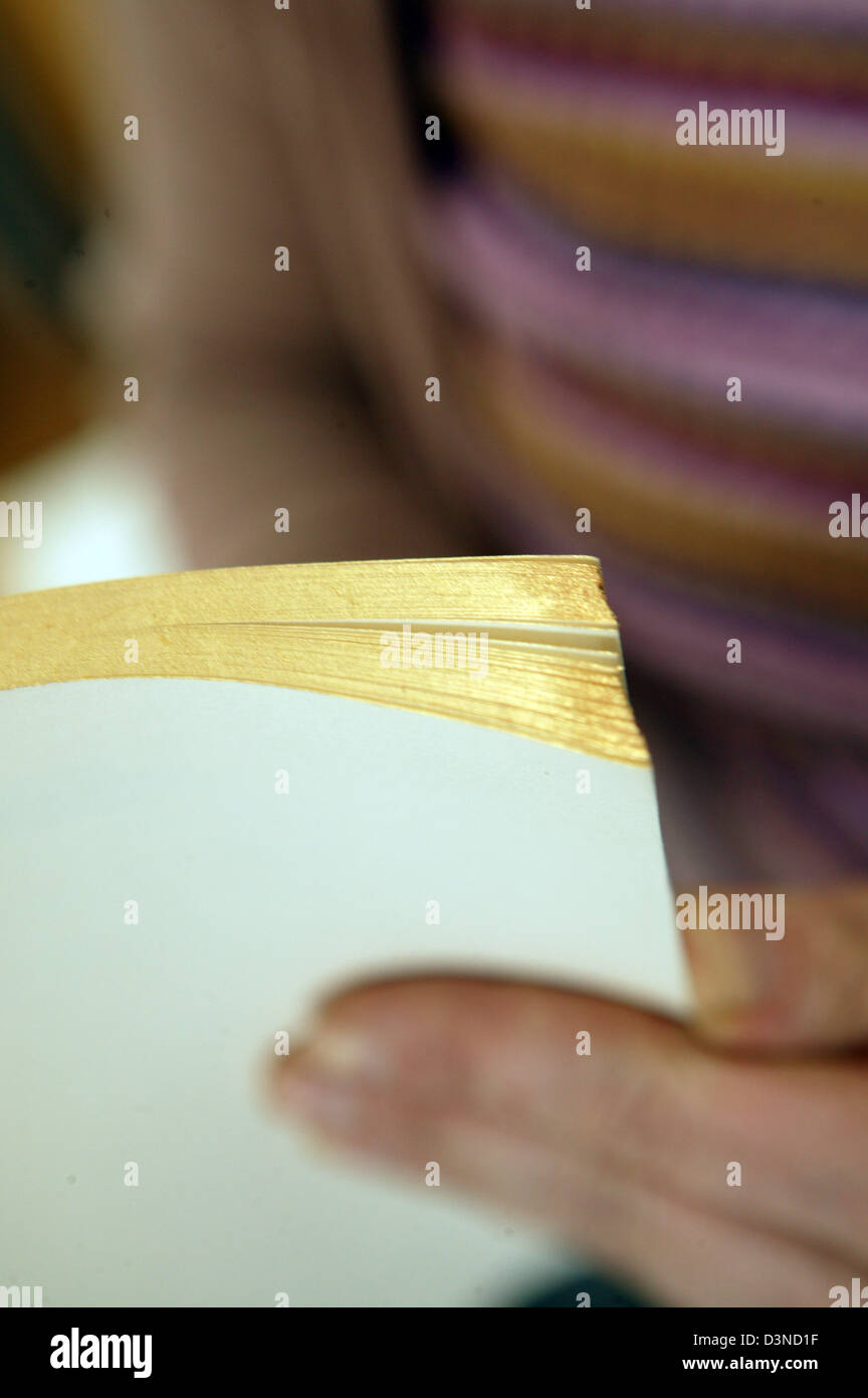 (FILE) - Gilt edging pictured at a bookbindery, Germany, 2005. Photo ...