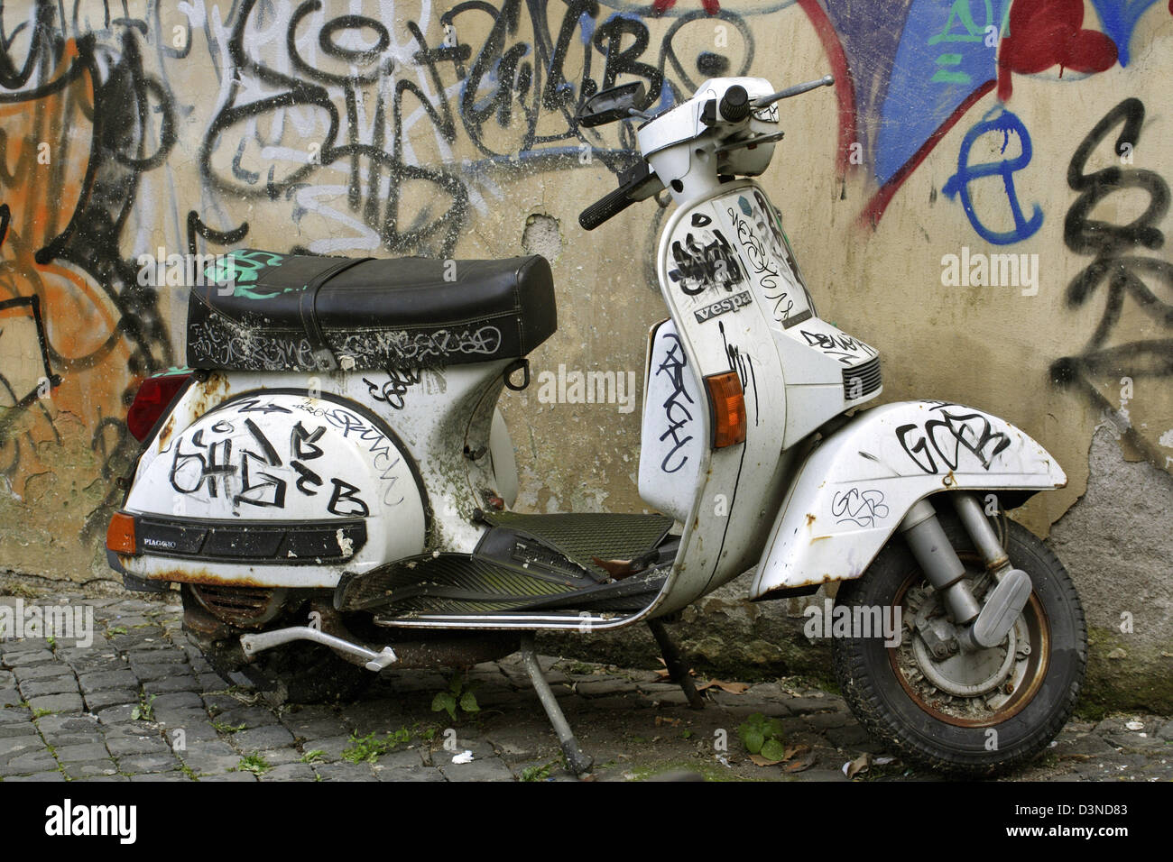 Human interest hum transport scooter wall graffiti italy hi-res stock ...