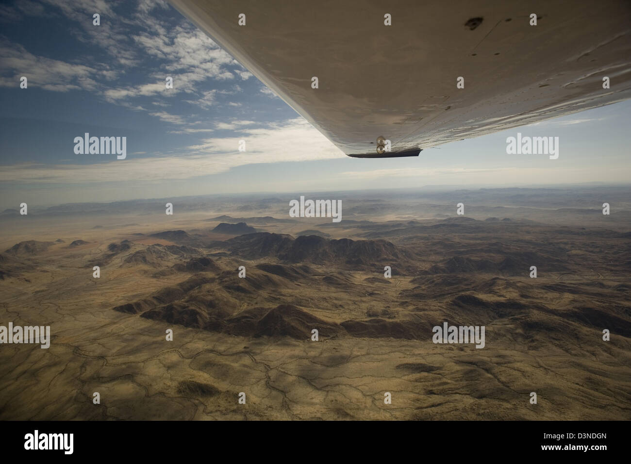Private jet in flight over desert, Namibia Stock Photo - Alamy
