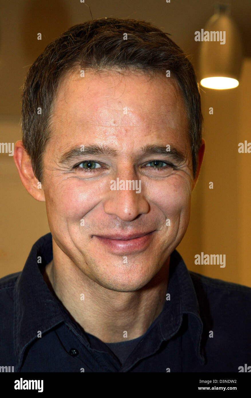 German actor Andreas Brucker smiles on the set of German TV production ...
