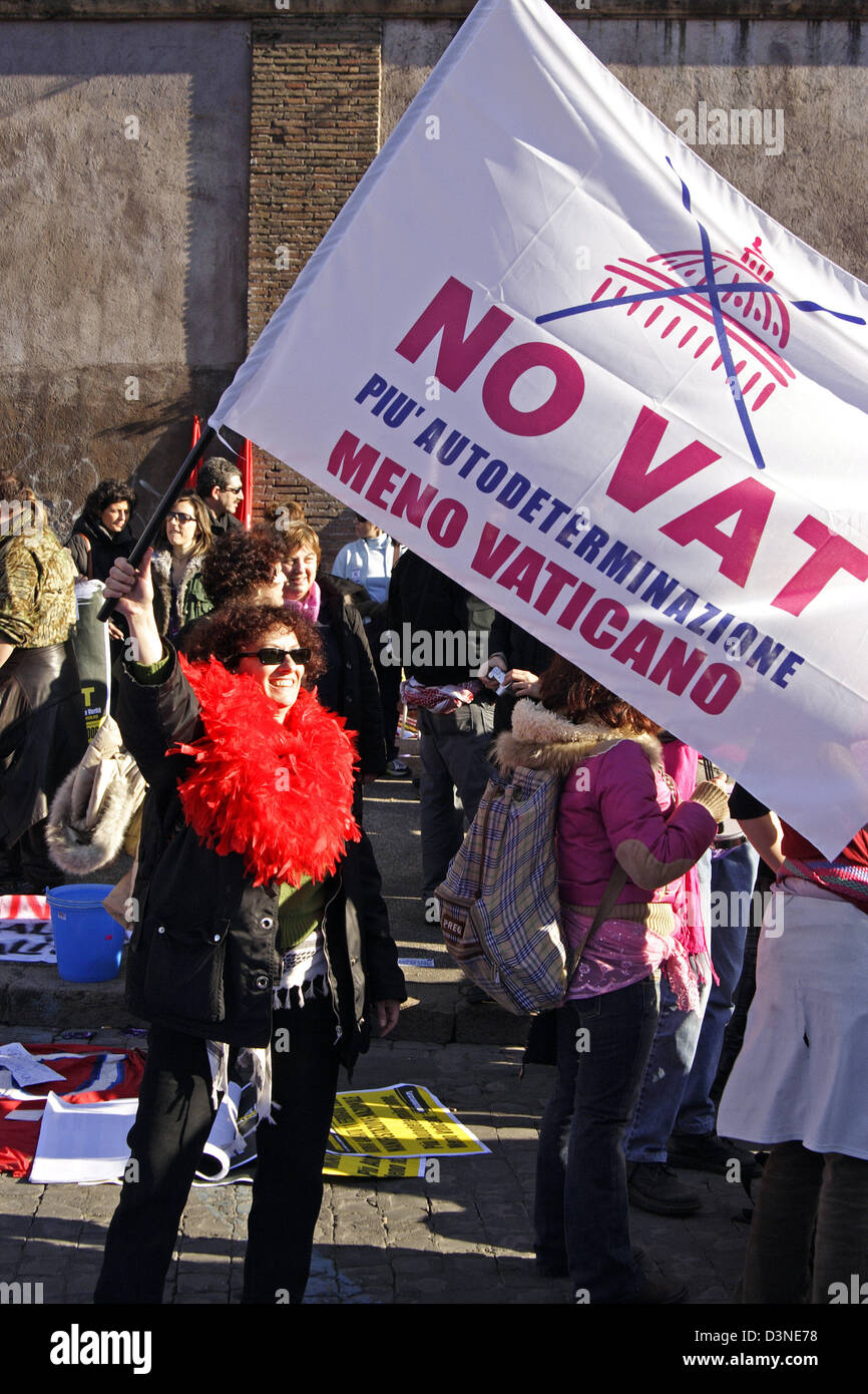 The picture shows participants of a demonstration, holding up a sign ...
