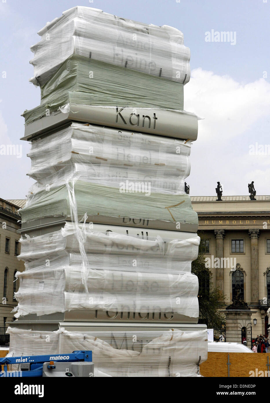 The sculpture 'The Bookworm' stands, still partly covered, in front ot ...