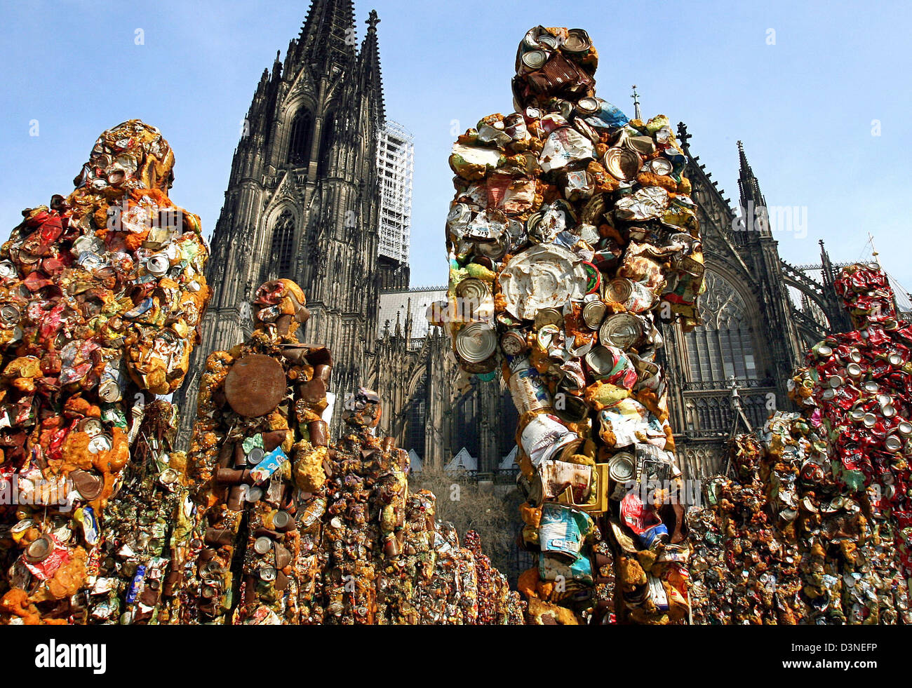 1,000 'Trash People' by the artist HA Schult stand in front of the ...
