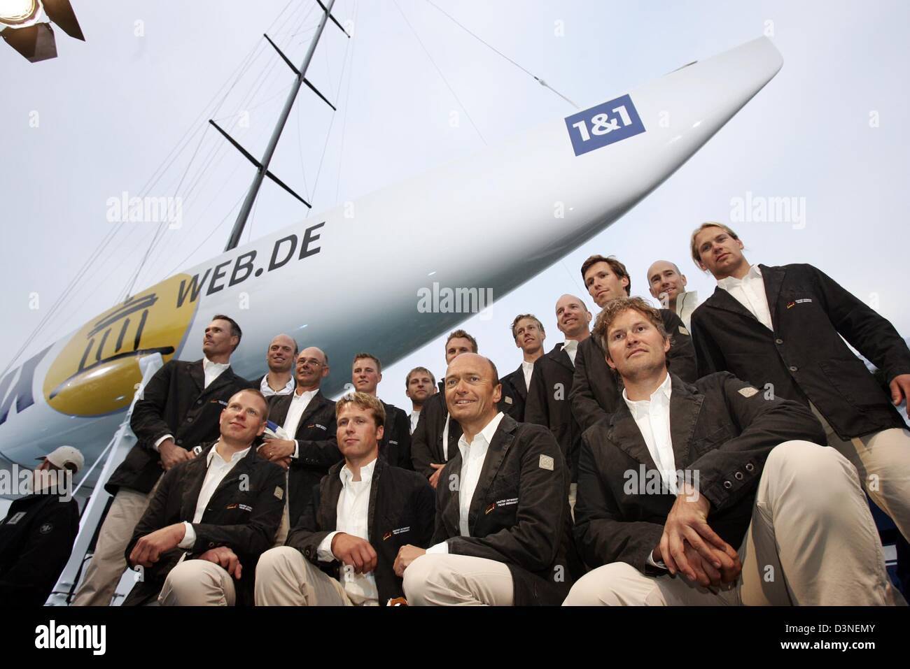 Skipper Jesper Bank (F2ndR) and his team pose for cameras after the ...
