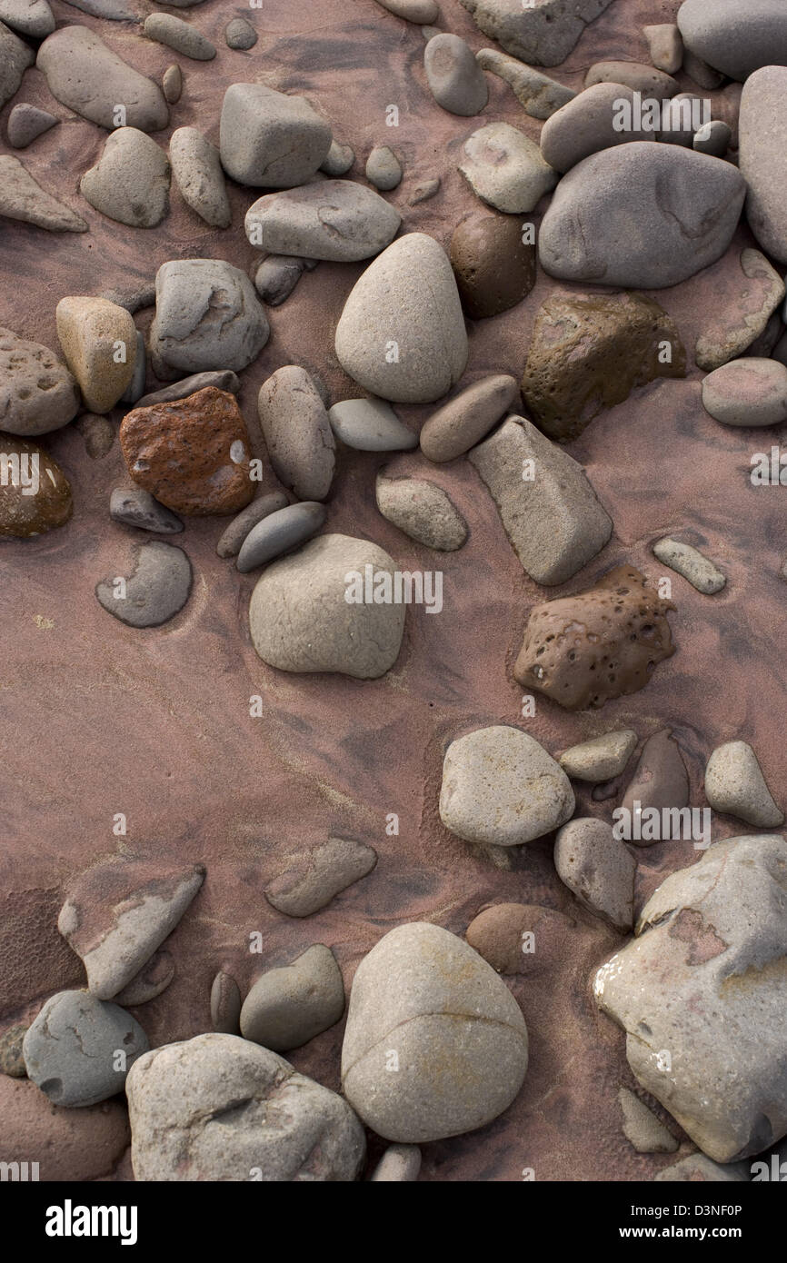 Granite pink sand and pebbles on beach in Namibia Stock Photo - Alamy