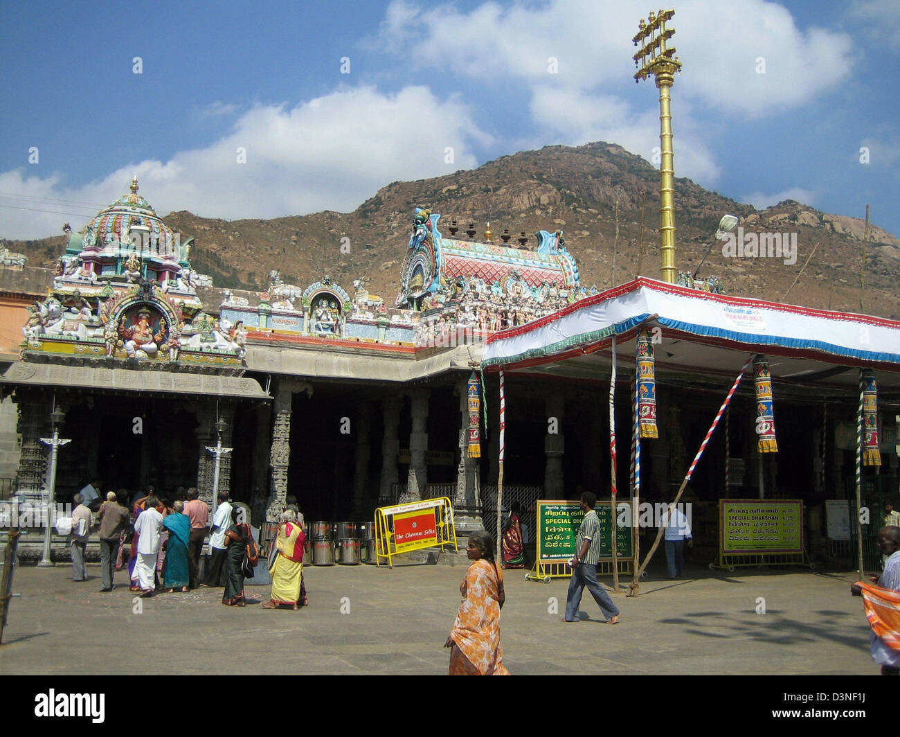 Pilgrims pray in front of the inner sanctuary of the temple facility ...
