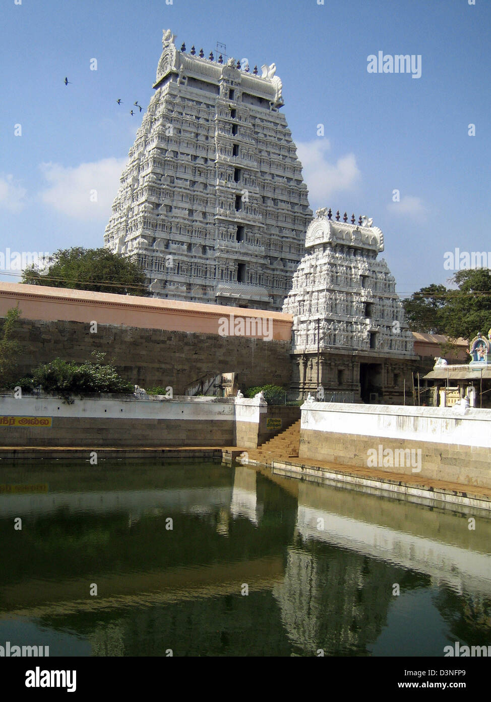 The picture shows the Brahma water basin in front of the Hindu temple ...