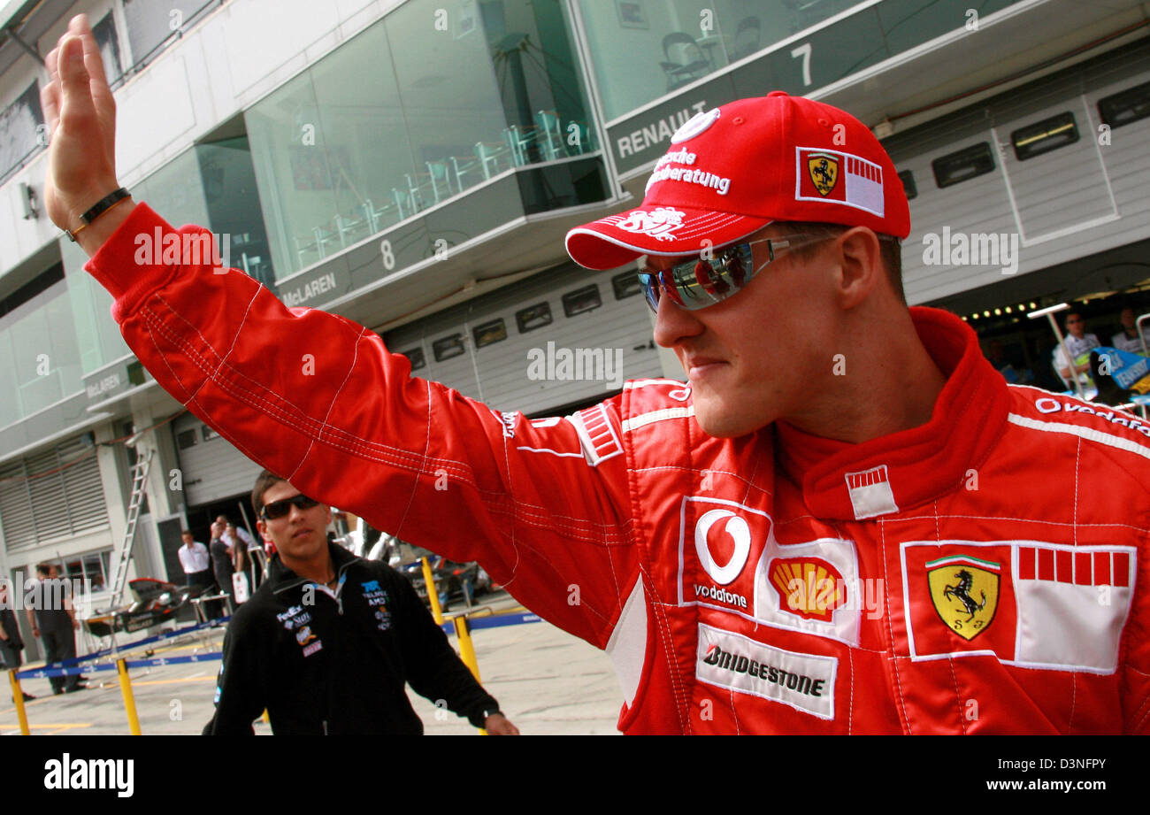 German Formula One pilot Michael Schumacher of Scuderia Ferrari waves ...