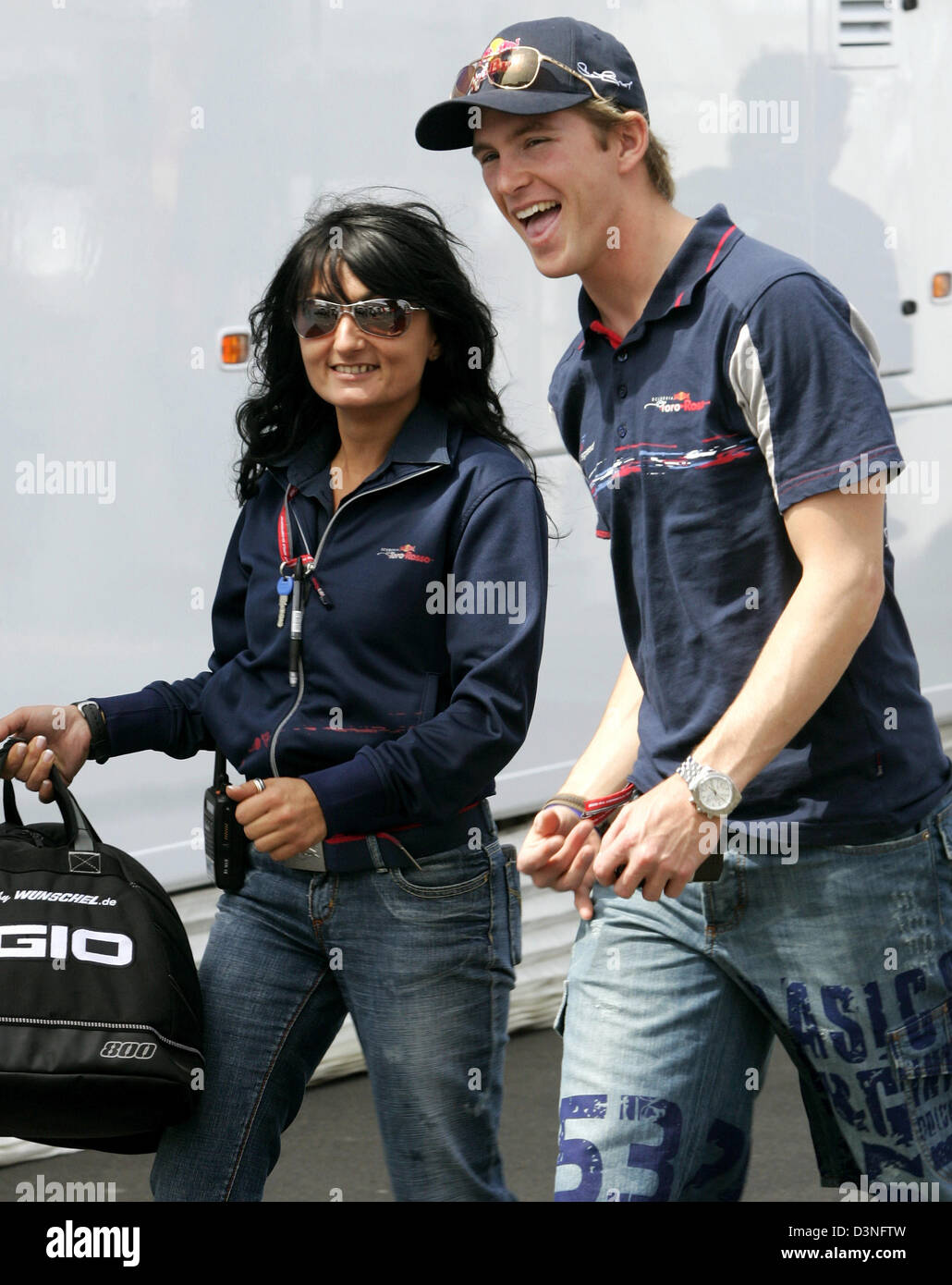 US Formula One pilot Scott Speed (R) of Scuderia Toro Rosso arrives at ...