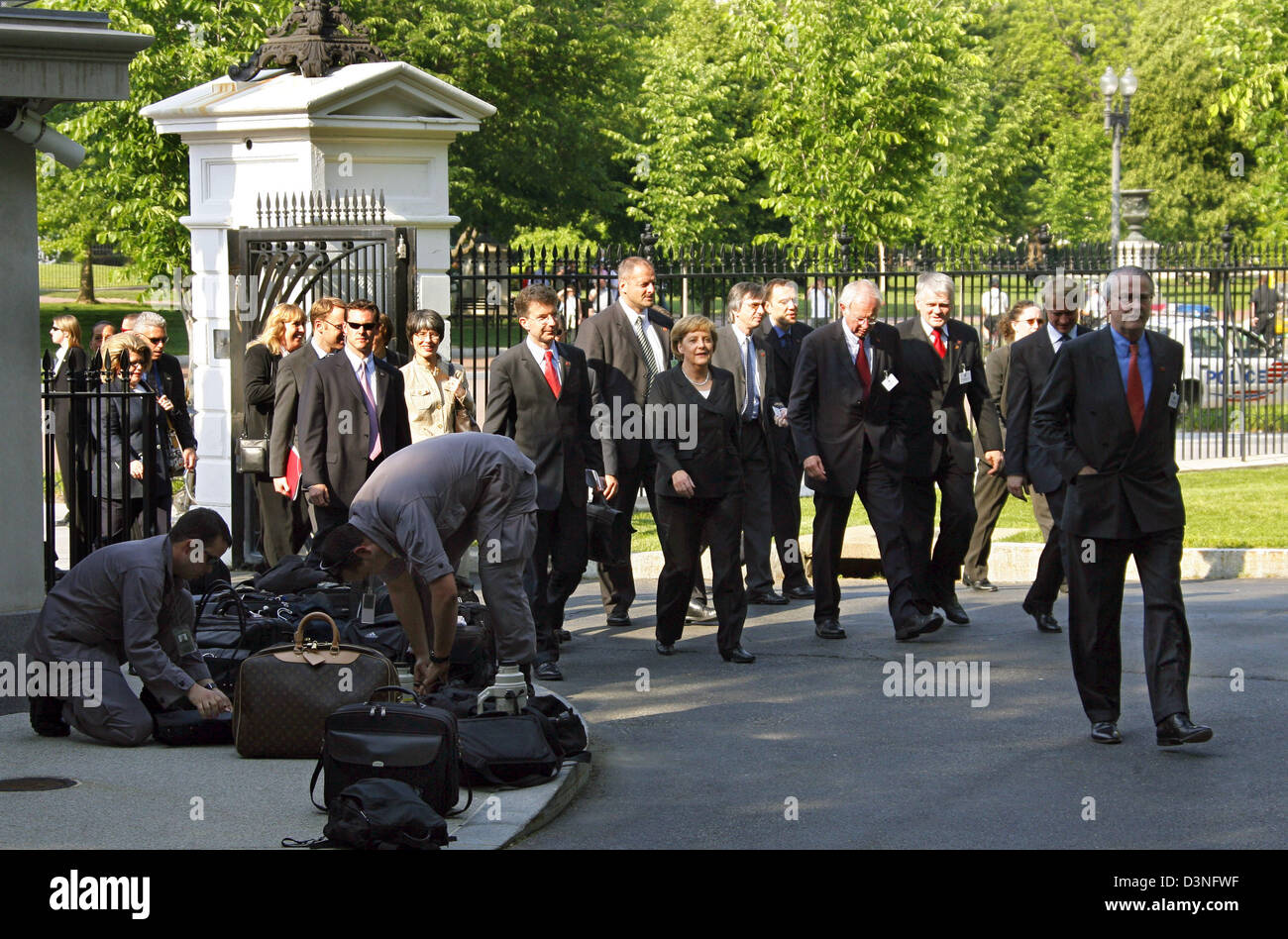 German Chancellor Angel Merkel arrives through the western gate to meet ...