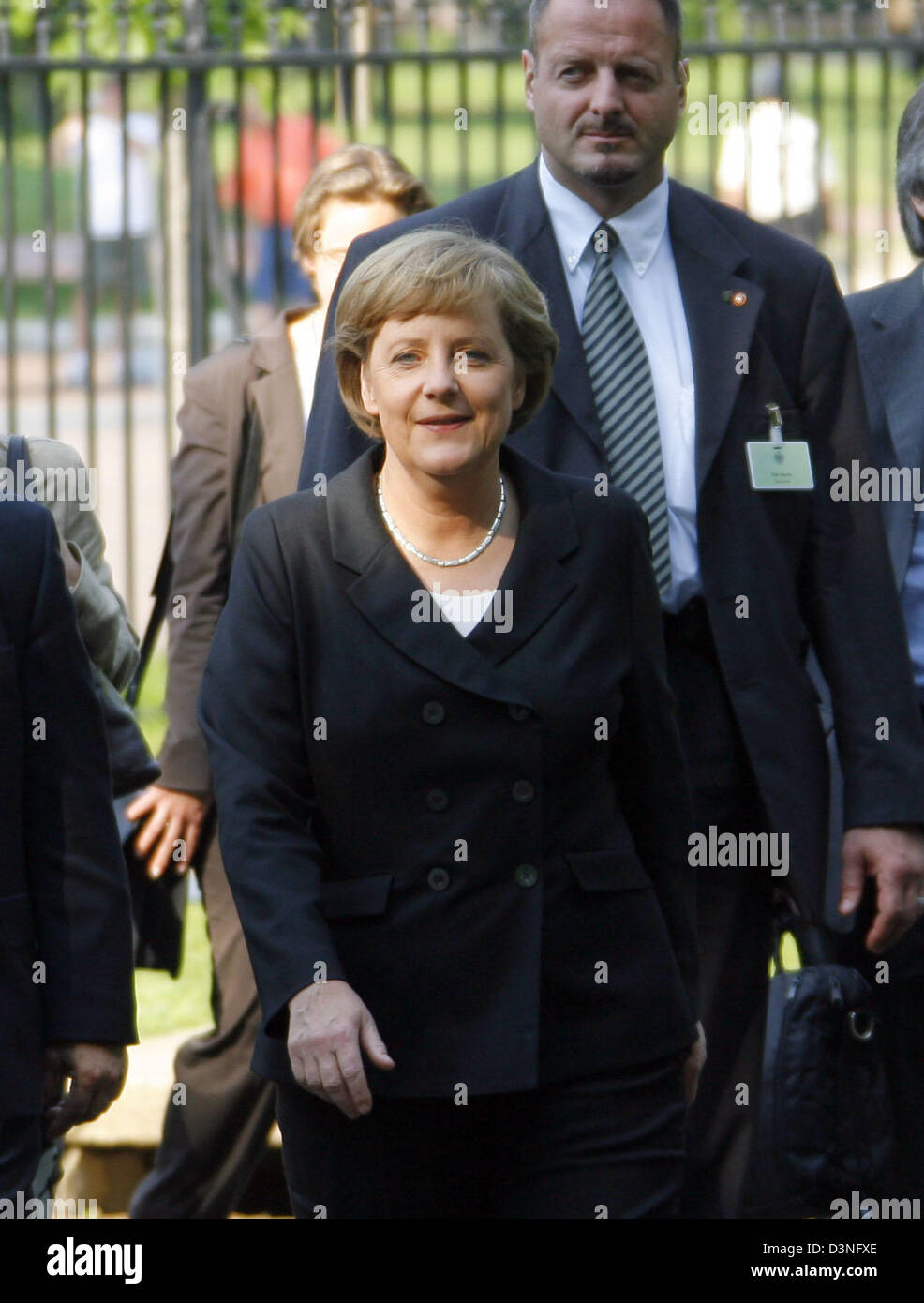 German Chancellor Angela Merkel arrives through the western gate to ...