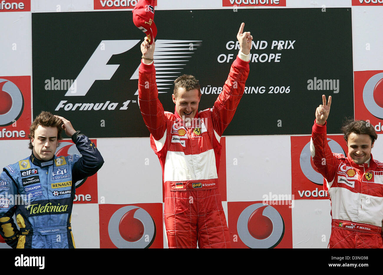 German Formula One driver Michael Schumacher (C) of Scuderia Ferrari ...