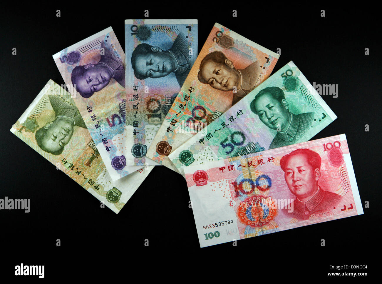 The photo shows several banknotes of the Chinese currency Renminbi with ...