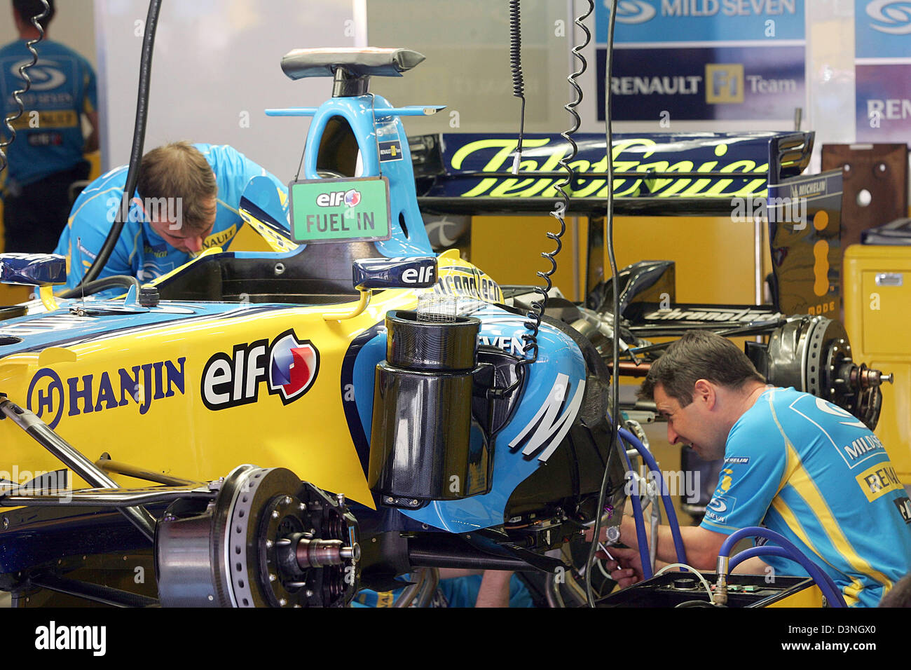 Mechanics of the Renault Formula One team prepare the car of Spanish ...
