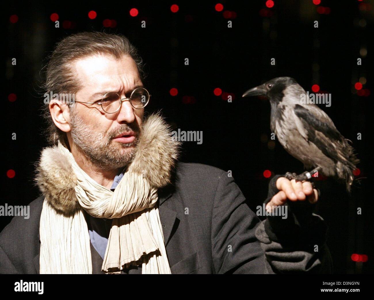 Swiss artist Hans Peter Litscher rehearses with a bird a scene of echo ...