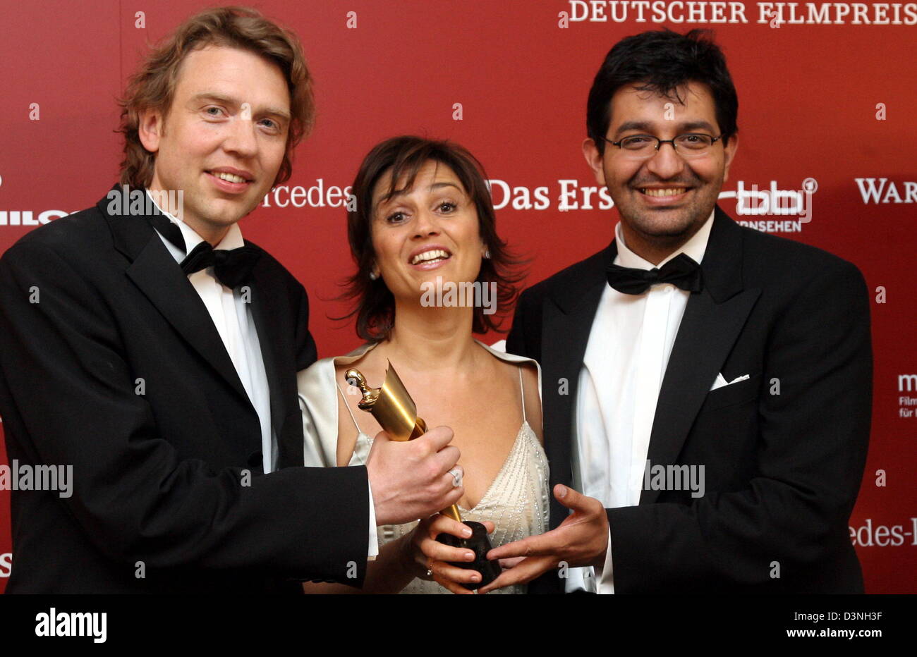 Award winners Oliver Stoltz (L), Ali Samadi (R) and laudatory speech ...