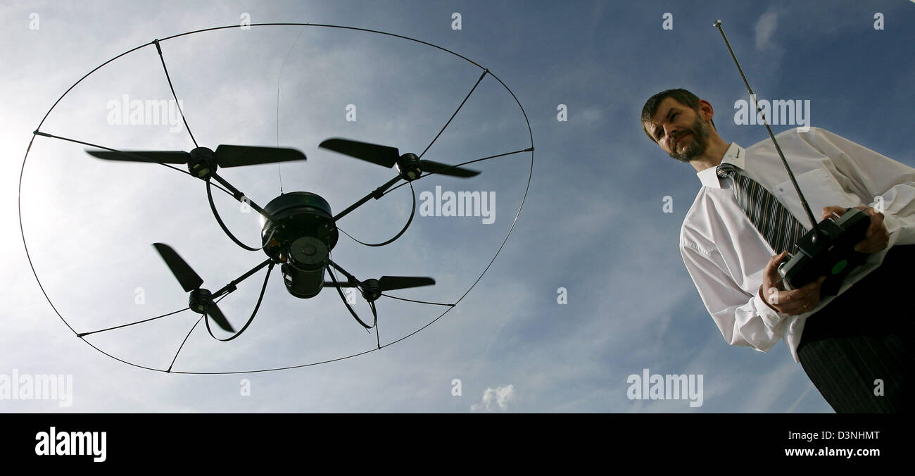An employee of the company AirRobot demonstrates a remote -controlled ...
