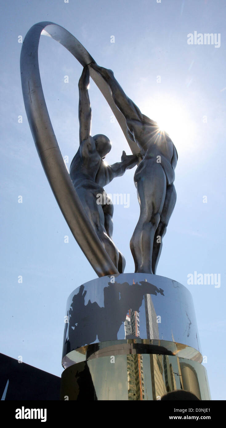 A statue of the Laureus World Sports Award stands in front of the Parc ...