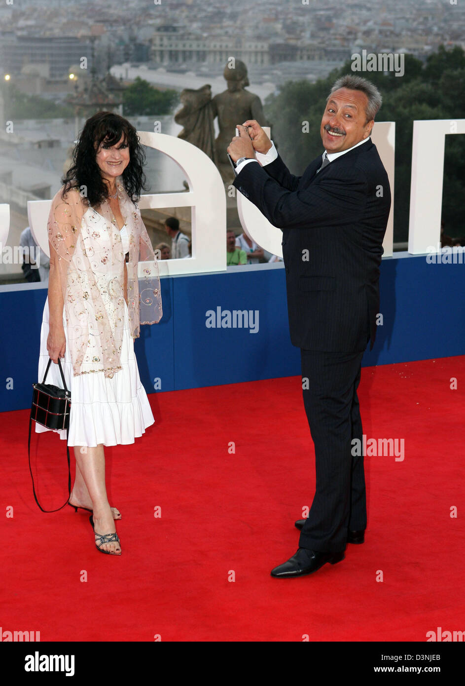 German actor Wolfgang Stumpf arrives with his wife Christine at the ...