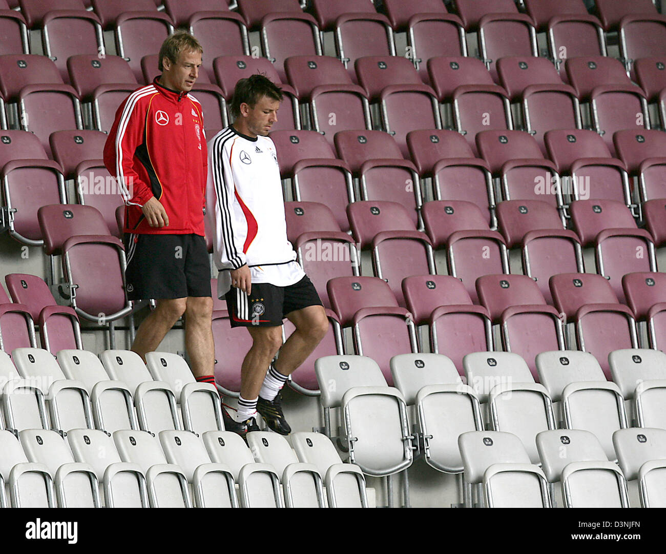 German national coach Juergen Klinsmann (l) and national player Bernd ...