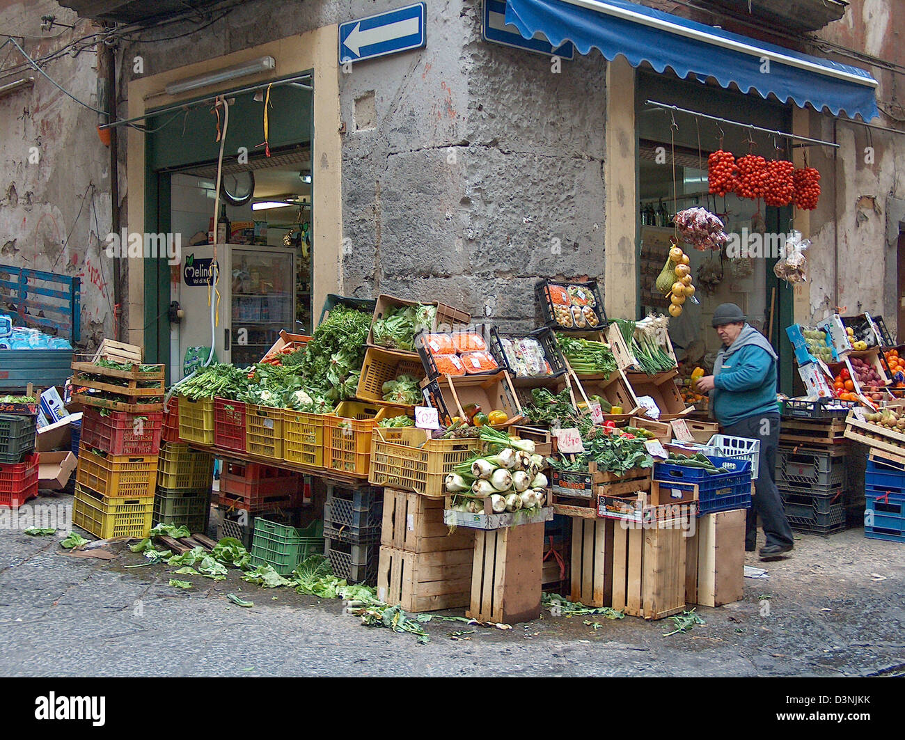 A vegetable trader photographed in the 'Quartieri Spagnoli' in Naples ...