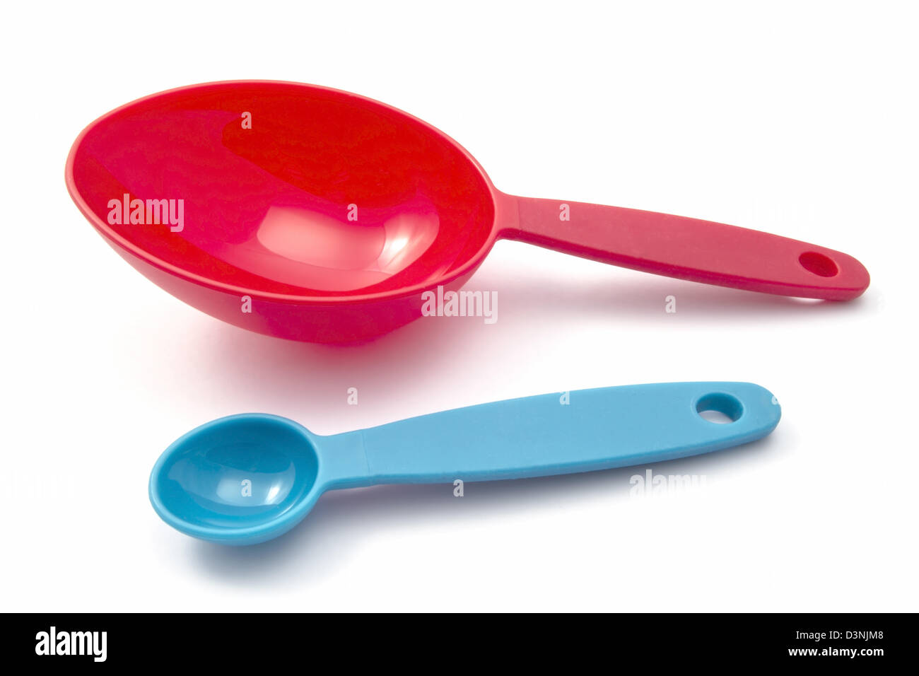 measuring spoons closeup on white background Stock Photo - Alamy
