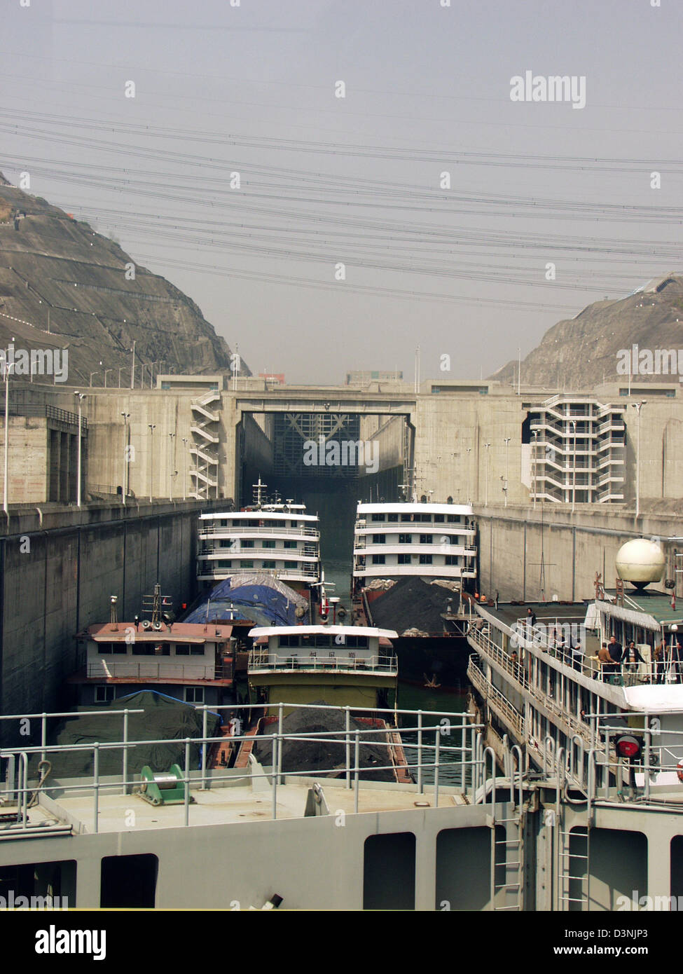 Freight and passenger ships are packed at the watergate of the Three ...