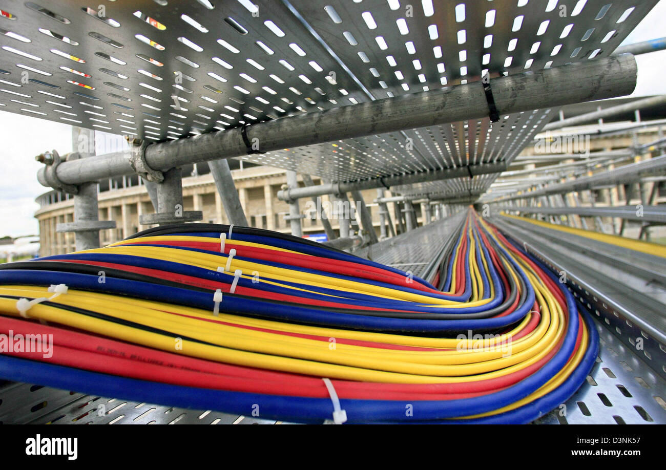 Thick strings of broadband cables are installed at the Olympic stadium ...
