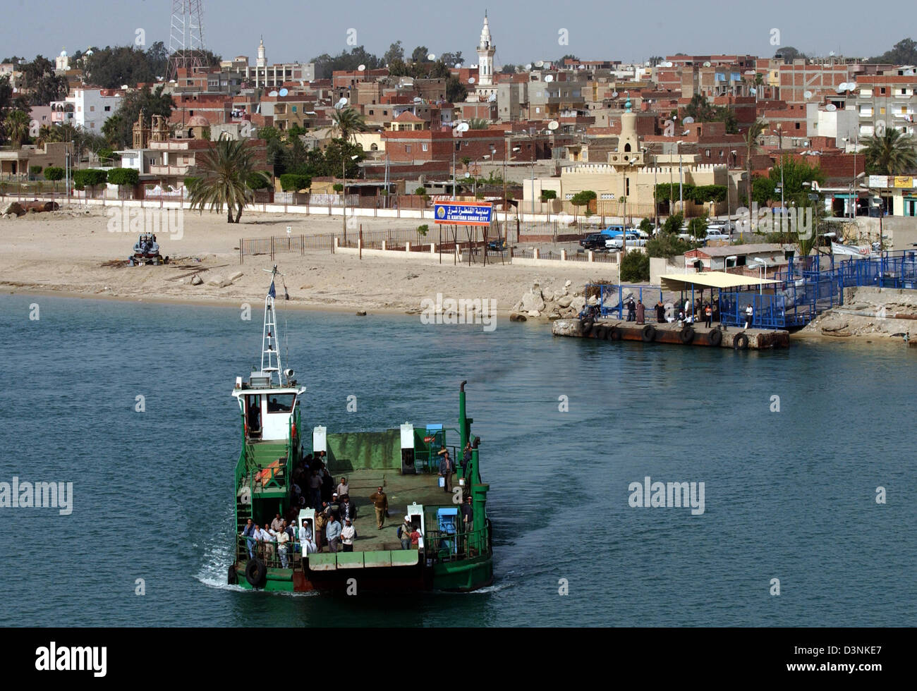 A small ferry pictured on the Suez Canal, Egypt, 17 April 2006. The 195 ...