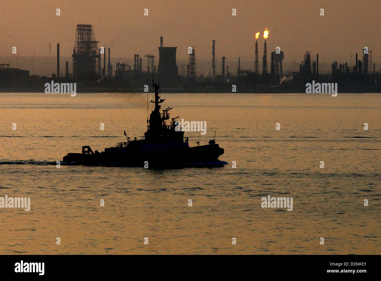 A petroleum refinery pictured in the sunset in Suez, Egypt, 17 April ...