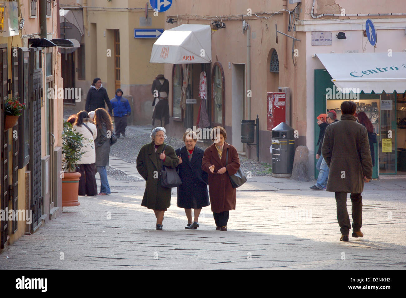The photo shows pedestrian in the centre of Alghero on the west coast ...