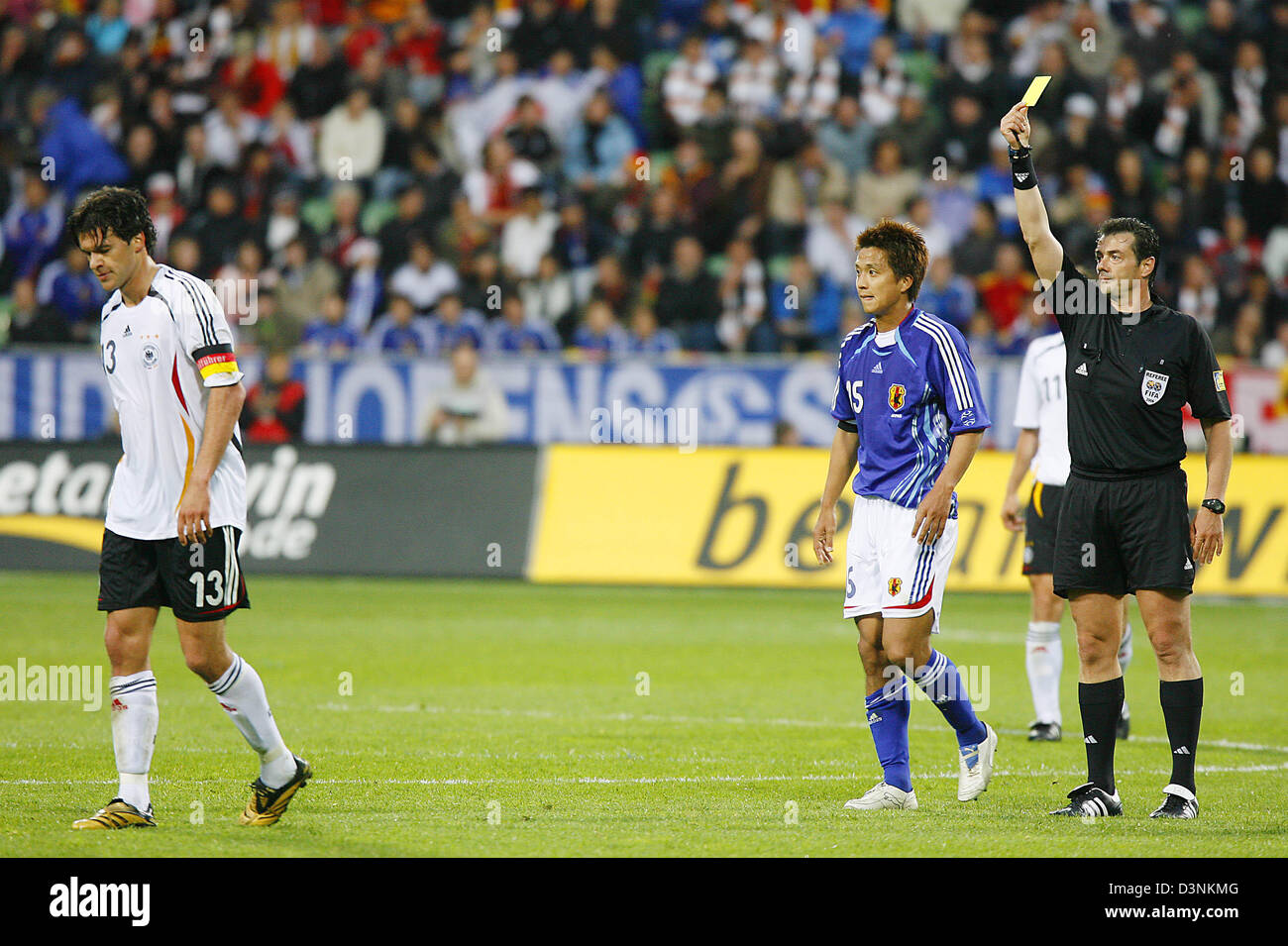 Greek referee Kyros Vassaras (R) books German national soccer team ...