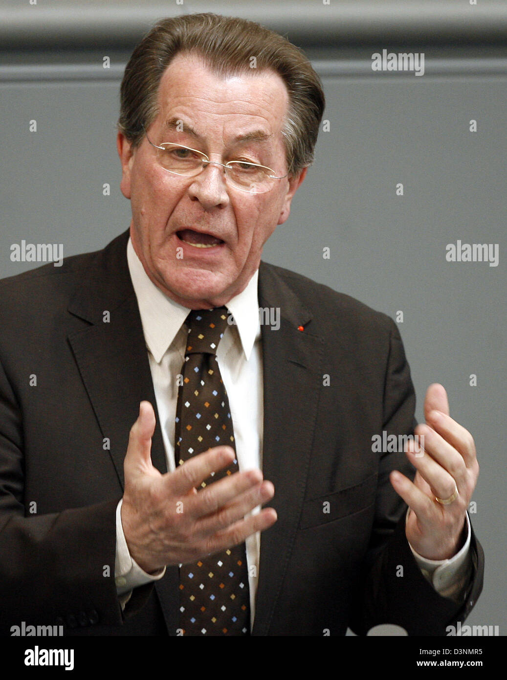 German Vice-Chancellor and Labour Minister Franz Muentefering gestures ...