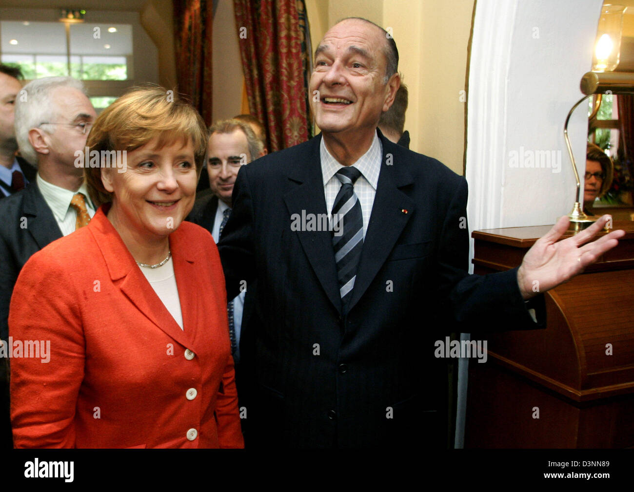 German Chancellor Angela Merkel (L) and French President Jacques Chirac ...