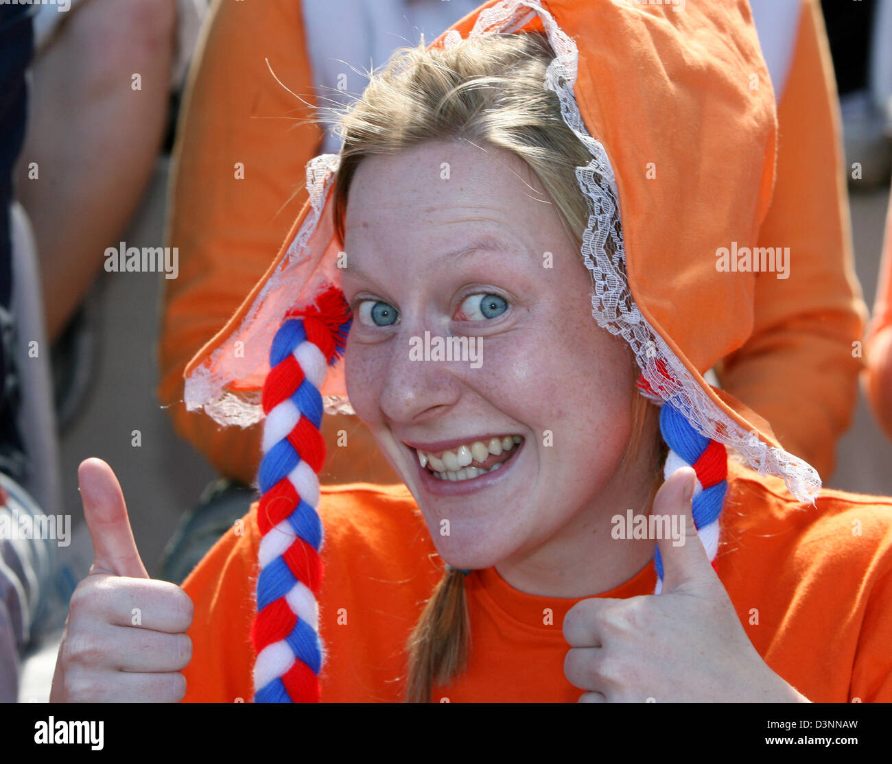 Dutch national soccer team fan Ria smiles during the team's public ...