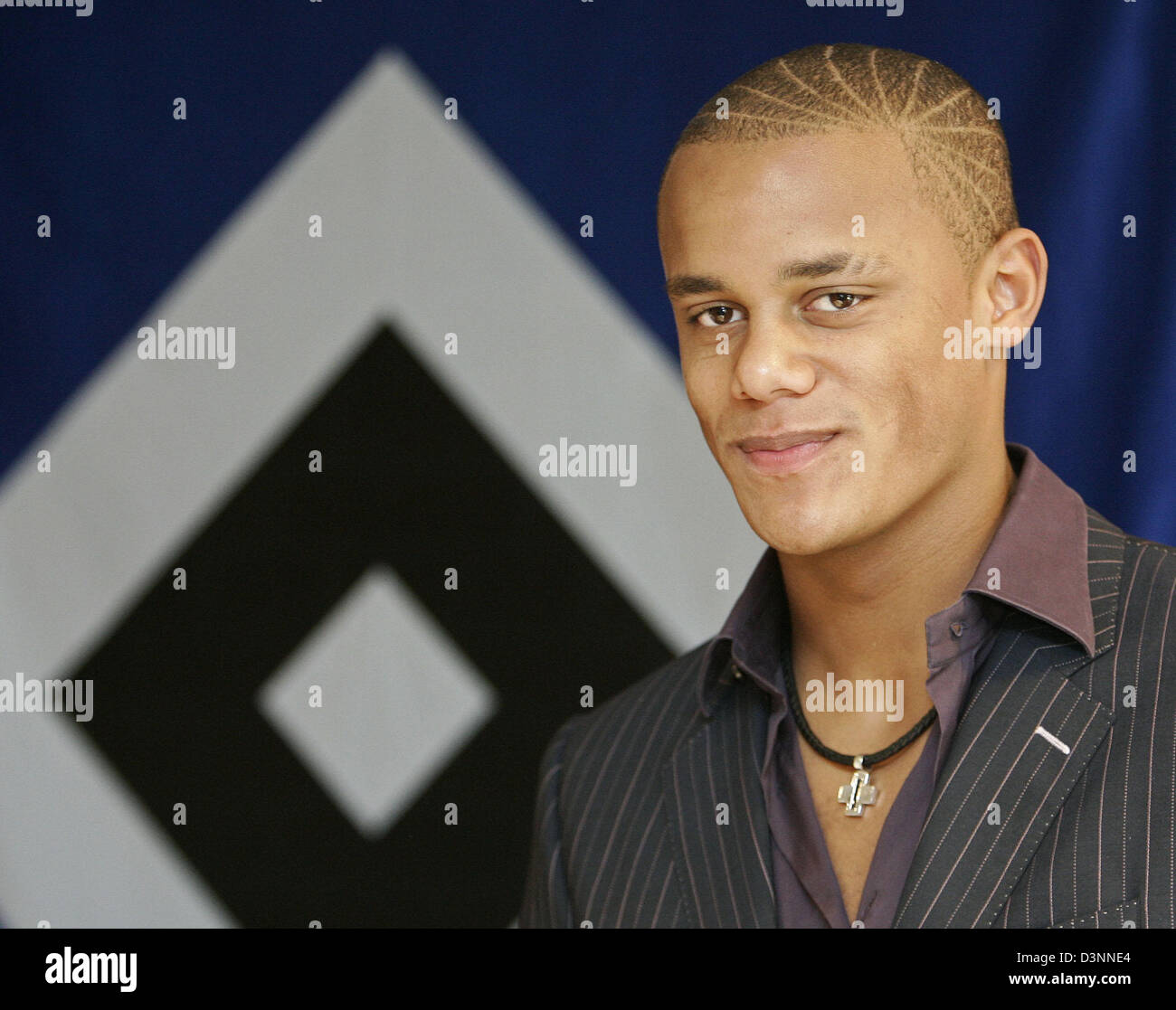 Belgian national soccer player Vincent Kompany smiles during a press ...