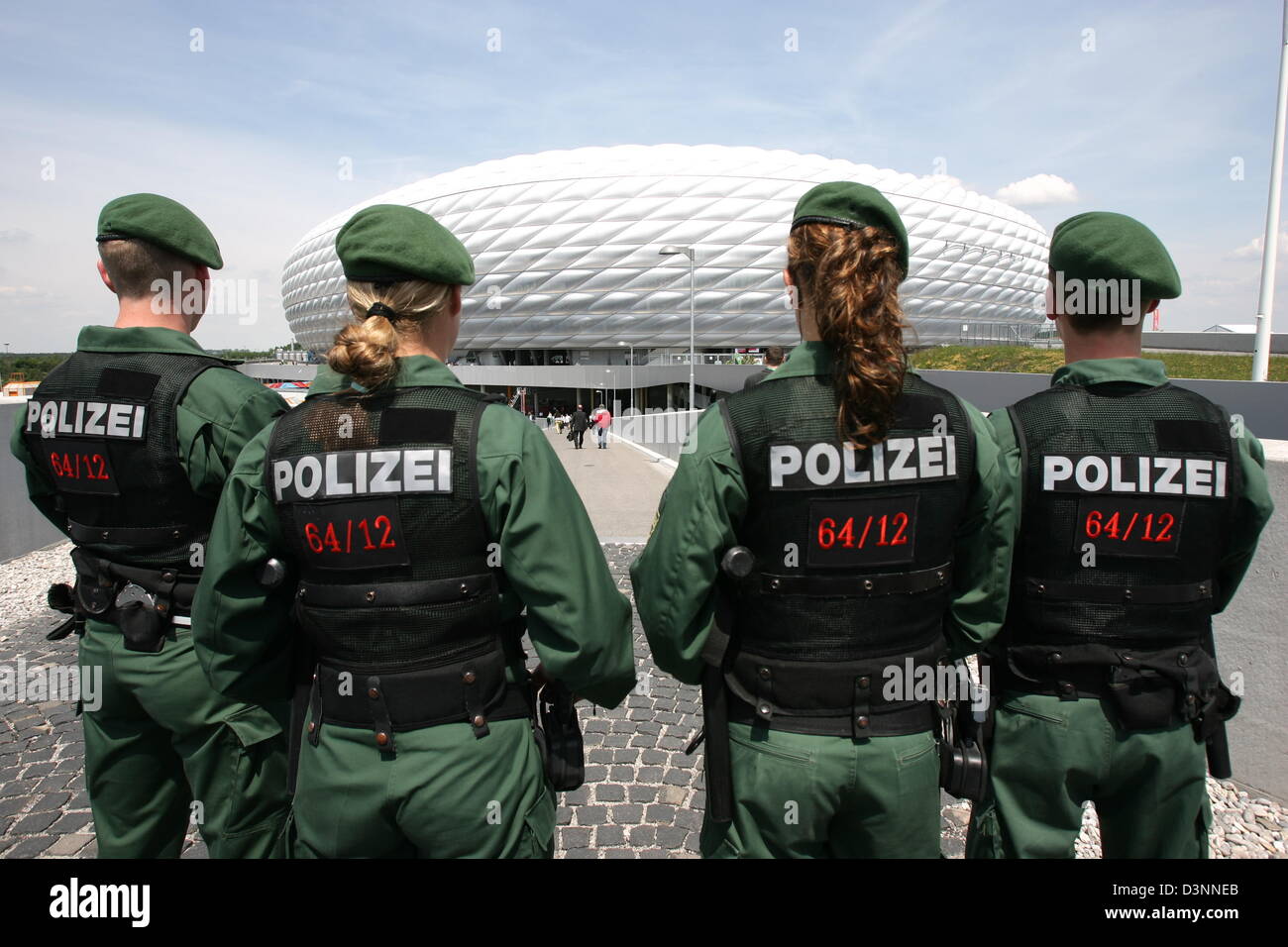 German police officers stand in front of the FIFA World Cup Stadium ...