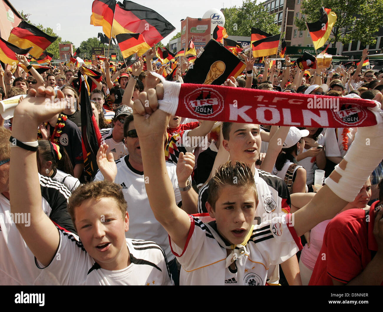 Fans of Germany cheer at the Fan Fest in Cologne, Germany, Friday, 9 ...