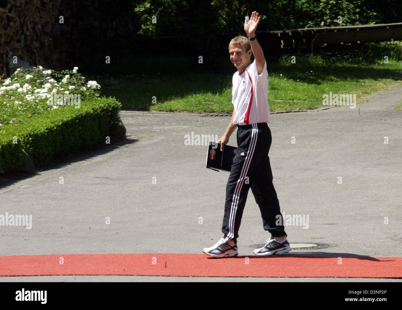 German national coach Juergen Klinsmann waves to the fans in Castrop ...