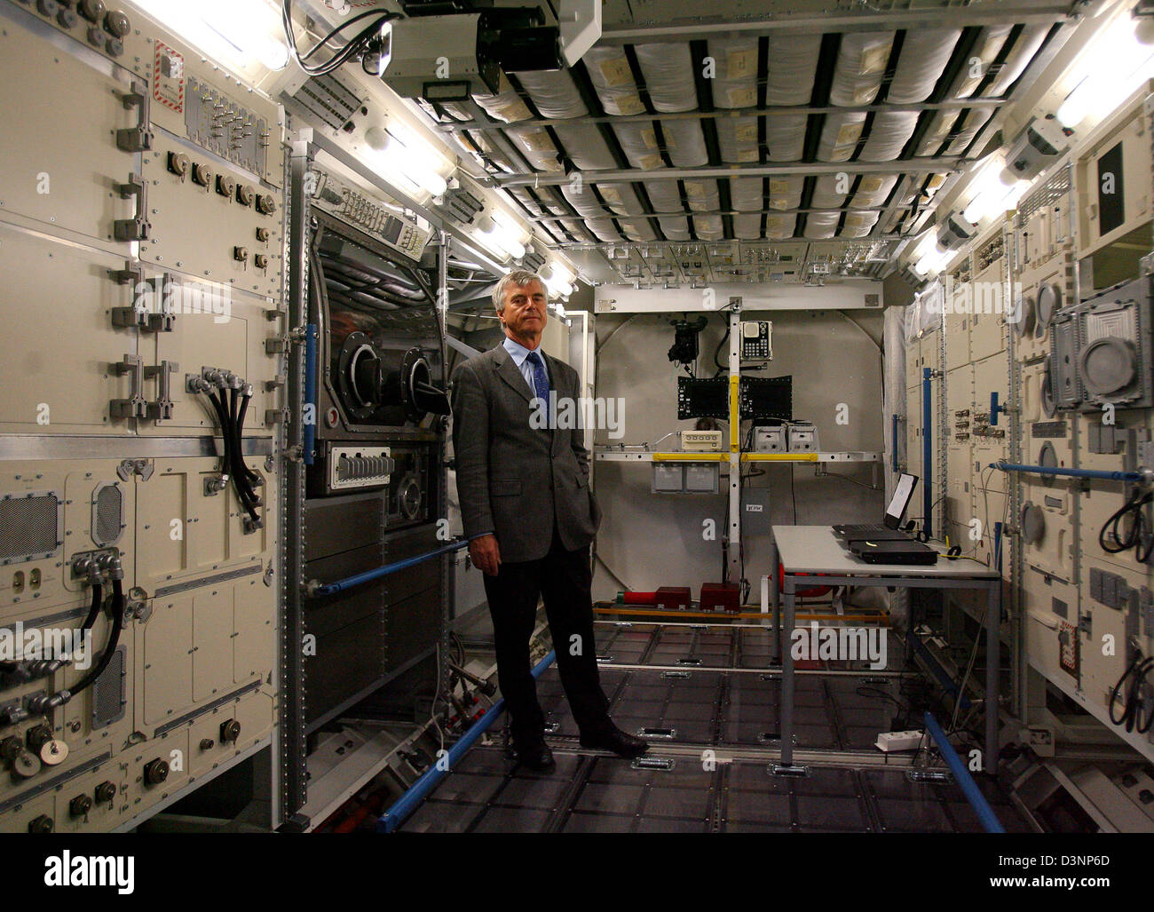 German astronaut Ulf Merbold stands in a flight simulator at the ...
